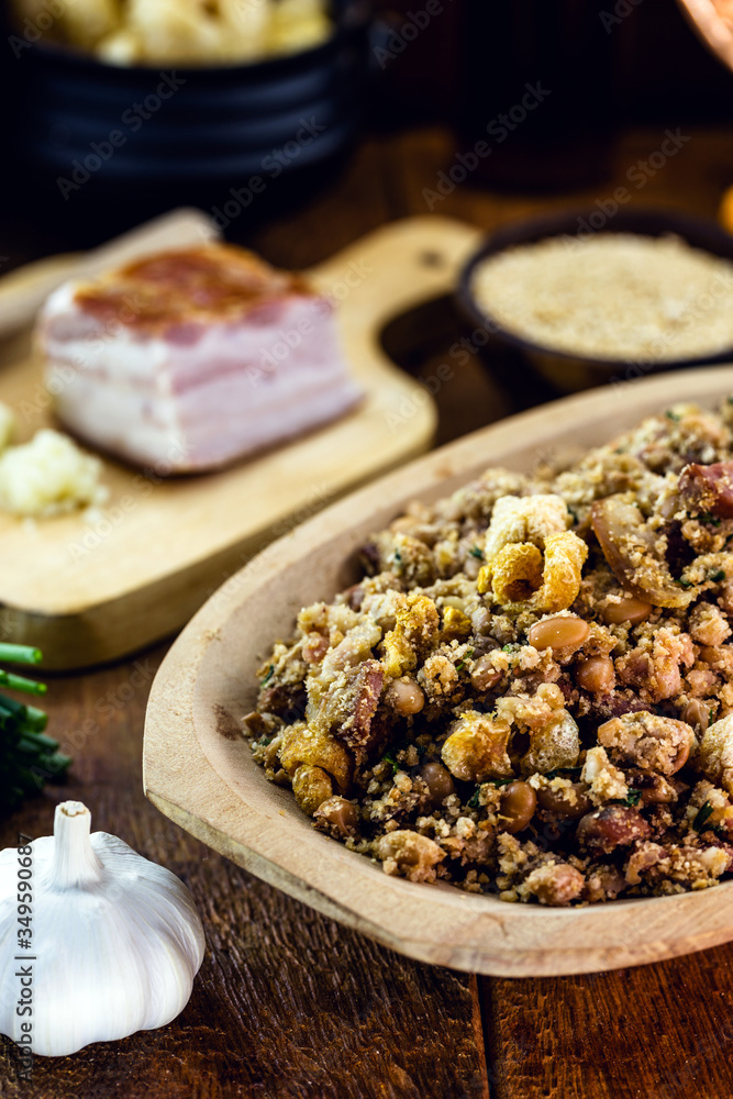 Beans with pork, called tropeiro beans in Brazil, typical Brazilian ...