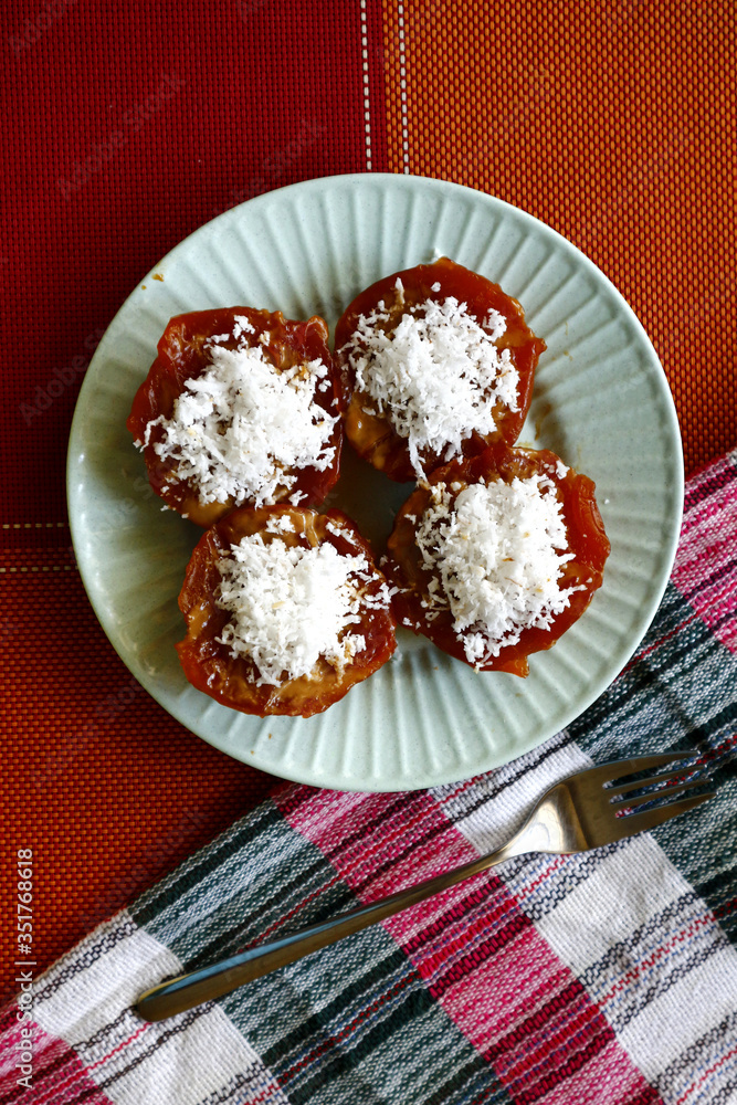 Filipino snack food called Kutsinta or glutenous rice cake with coconut ...