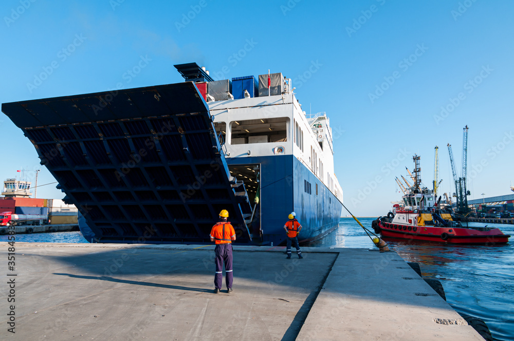Open Stern Quarter Ramp Ferry and workers at Port in Mersin, Turkey ...