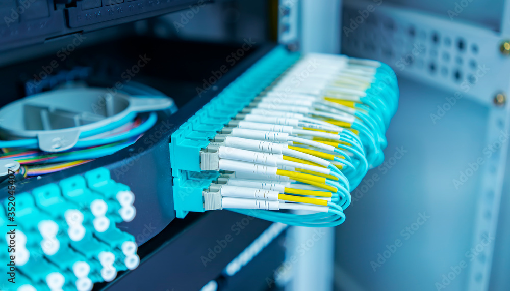 Fiber optic cable connect to communication Distribution point Stock ...