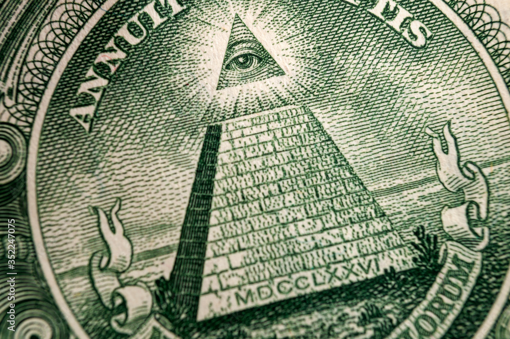 American money, illuminati and mystical symbols concept with macro ...