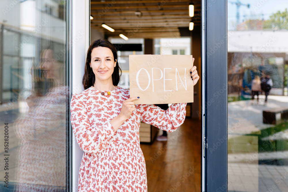Asian young asian woman setting open sign at the shop glasses for ...