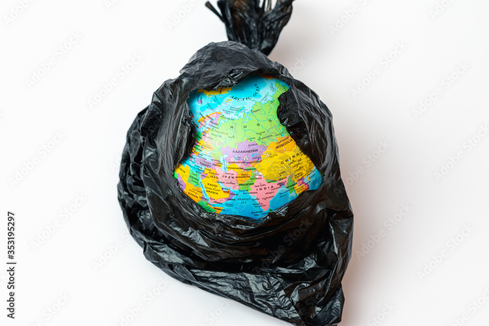 Photo Stock World Globe inside plastic bag you can see in hole ...