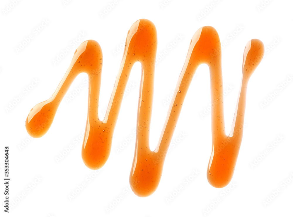 Caramel syrup drizzle isolated on white background. Splashes of sweet ...