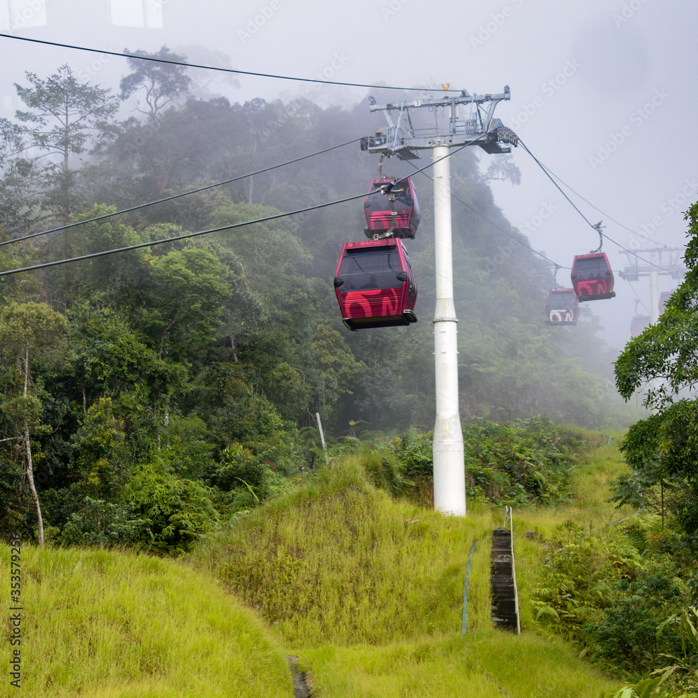 In a ropeway cable car going up from kualampur to genting highlands ...