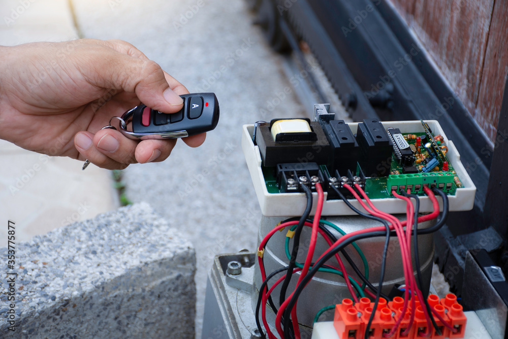 Foto de Stock Technician man hand using remote control, testing and ...