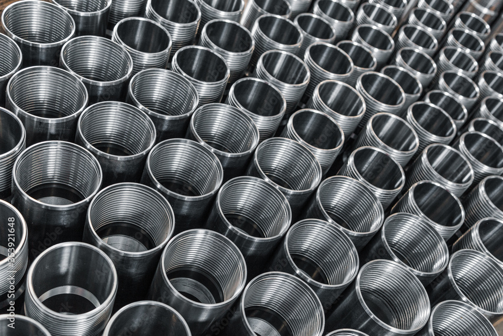 Closeup pattern of shiny circular precision stainless steel industrial ...