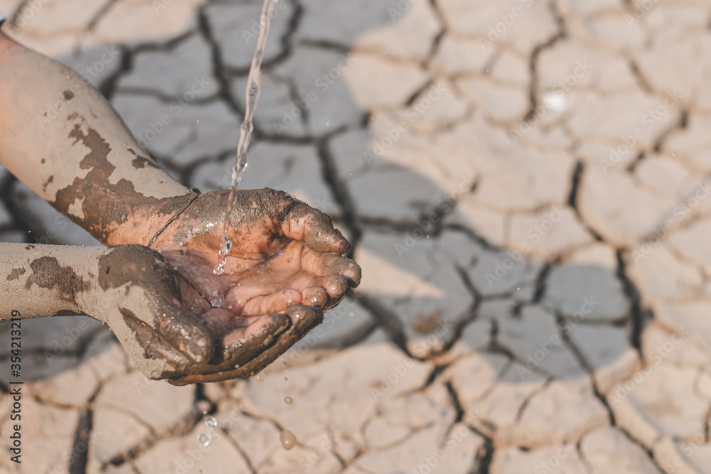 The little boy waiting for drinking water to live through this drought ...