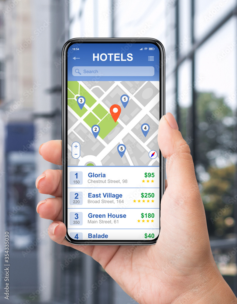 Female tourist picking hotel using GPS map with navigation pins on city ...