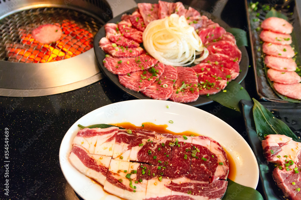 Premium raw beef sliced set; wagyu, chuck, tongue tenderloin, strip ...
