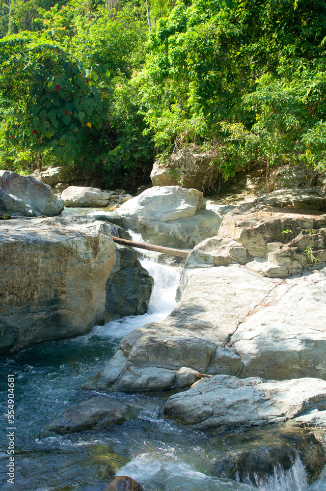 Amazing river with smooth rocks and series of waterfalls in the ...