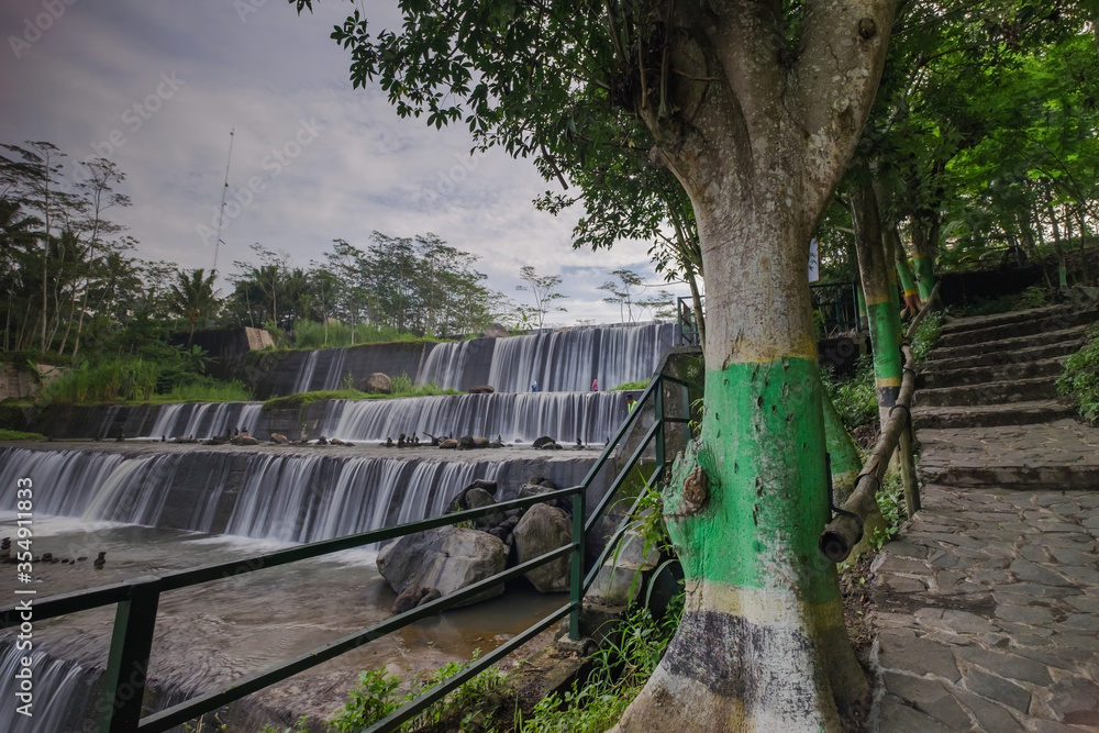 (Grojogan Watu Purbo) Watu Purbo waterfall is a multi-storey river dam ...