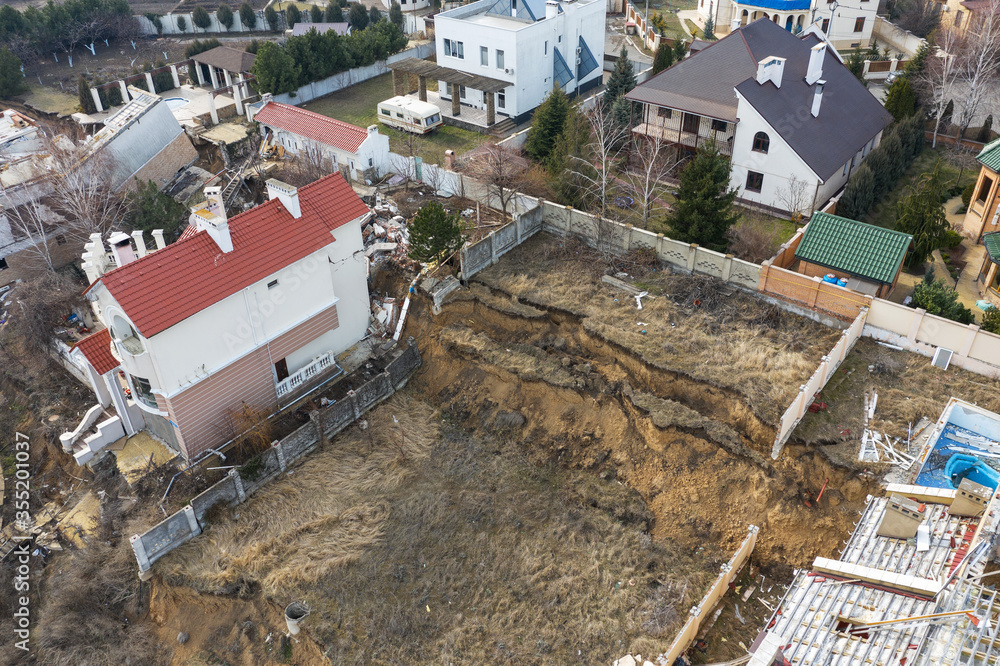 Landslide caused by rains of hurricane destroyed expensive cottages and ...