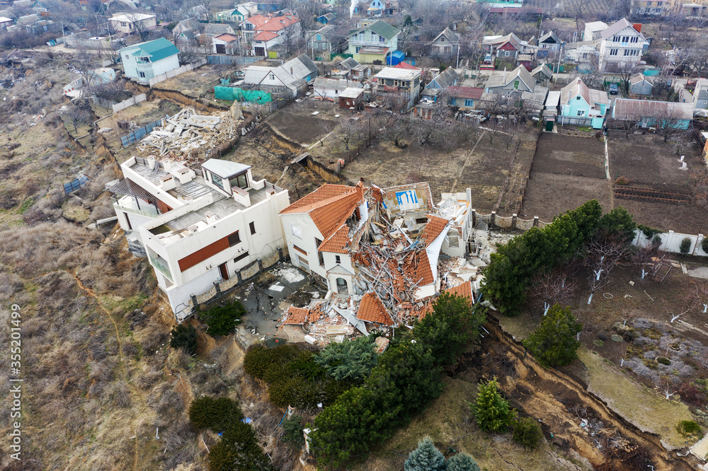 Landslide caused by rains of hurricane destroyed expensive cottages and ...