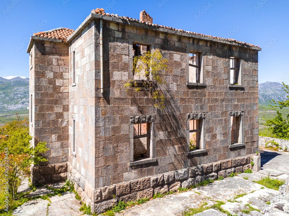 Abandoned and demolished stone building after a cataclysm, in need of ...