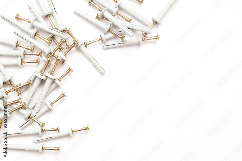 Construction dowels for concrete, stone, and walls are scattered on a ...