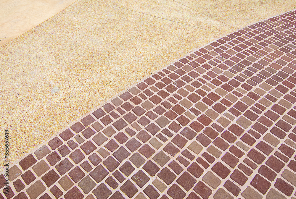 Sand wash gravel floor with beautiful color of tile on the walkway ...