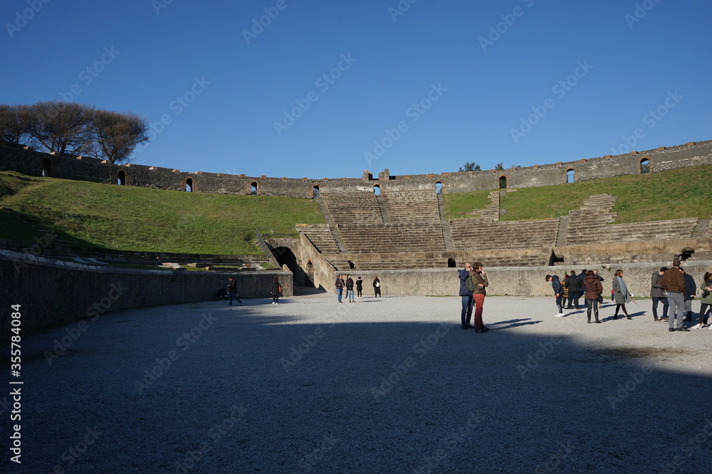 Amphitheater with people at Ruins of ancient city, in Pompeii, ancient ...