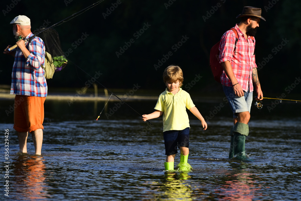 Little kid pulling fishing rod while fishing on weekend. Little ...