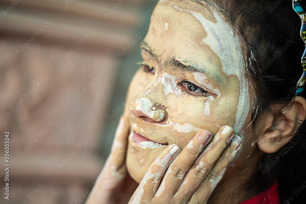 Young indian girl message ayurvedic natural hearbal cosmetic facial ...