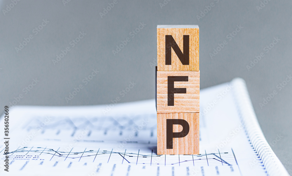 Word NFP - Non Farm Payrolls - acronym concept on cubes and diagrams on ...