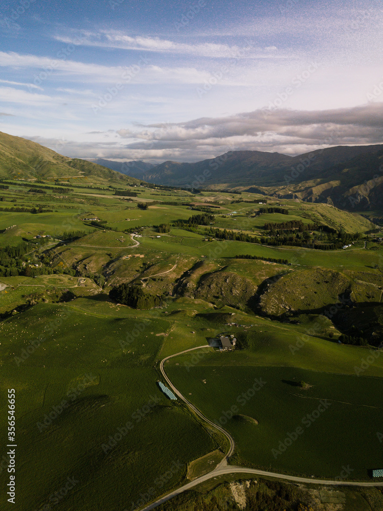 Foto de Stock Aerial photos around Crown Range winding road taken in ...