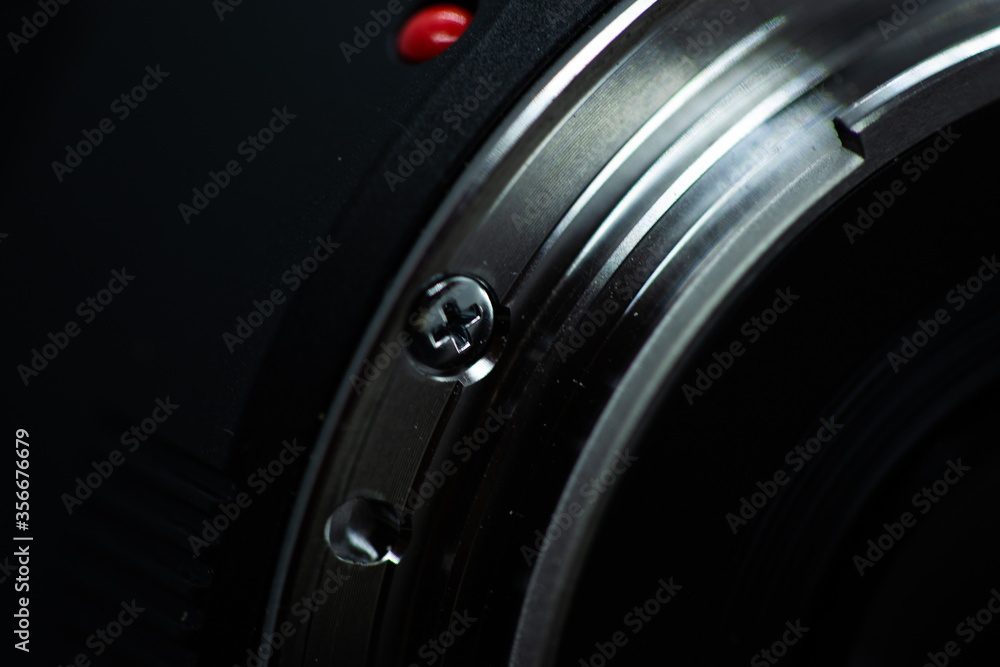 Macro closeup photo of lens to dslr camera on dark background view of ...