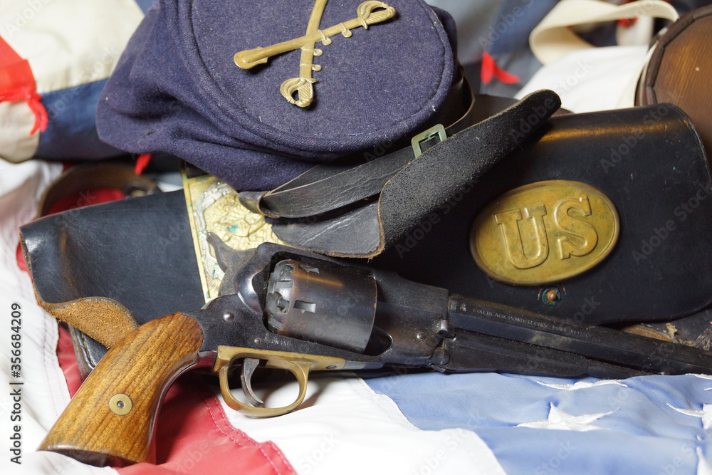 Civil War collectible antique pistol, hat and gear of the Union army on ...
