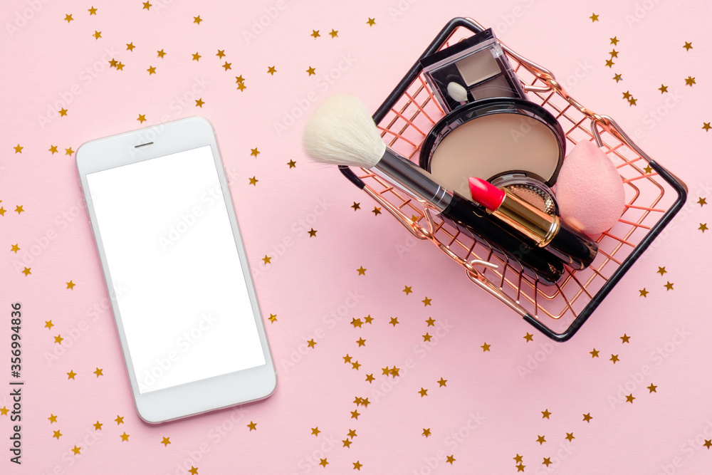 Buying beauty products online concept. Shopping basket with makeup ...