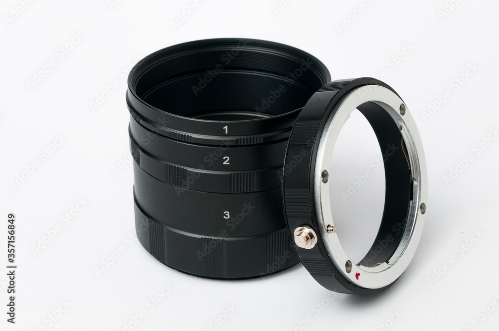 Foto de Stock Set of macro extension tubes and adapter ring used to ...