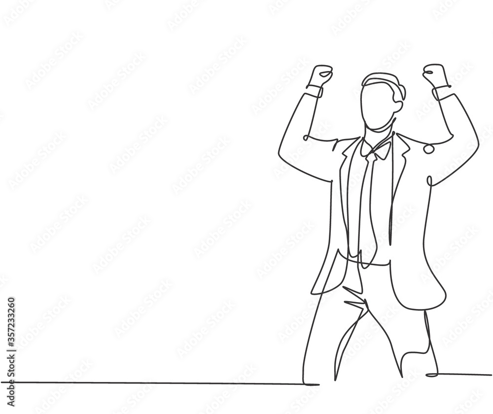 One single line drawing of young happy CEO standing and fist his hands ...