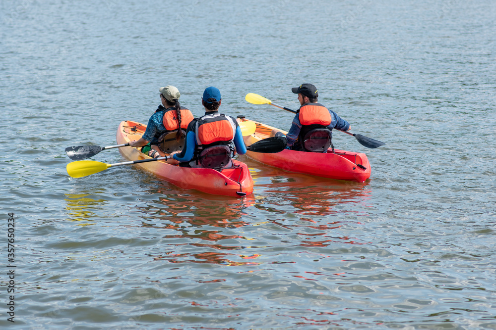 Three kayakers kayak on the Potomac River in Washington, D.C. Stock ...