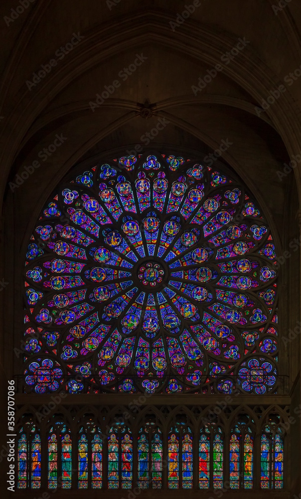 Paris, France - October 25, 2013: Closeup of stained glass of the ...