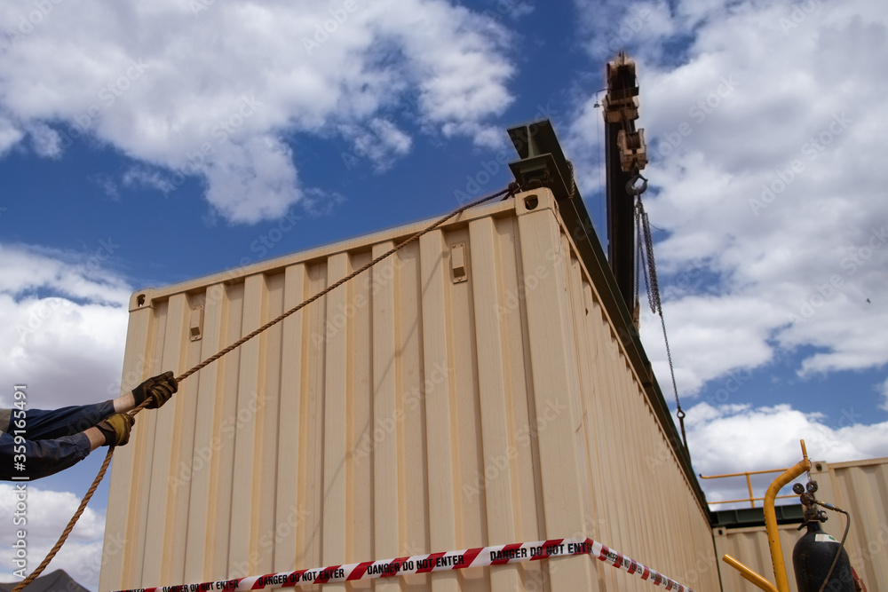 Safety workplace trained competent rigger wearing hand safety glove ...