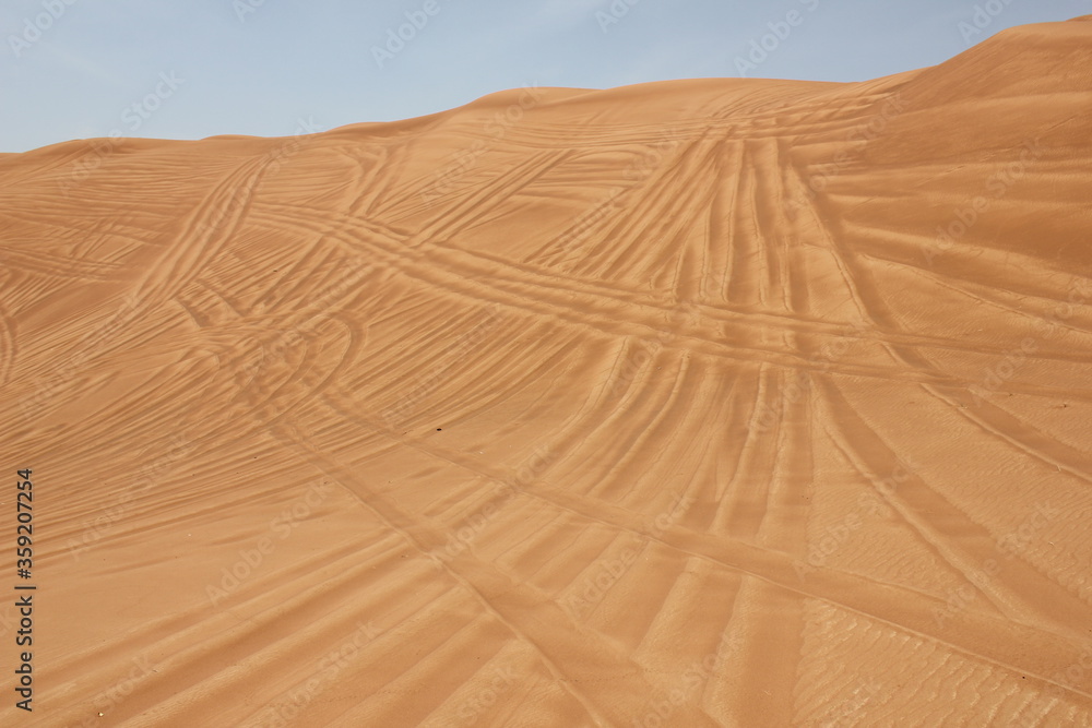 Hot and arid desert sand dunes terrain in Sharjah emirate in the United ...