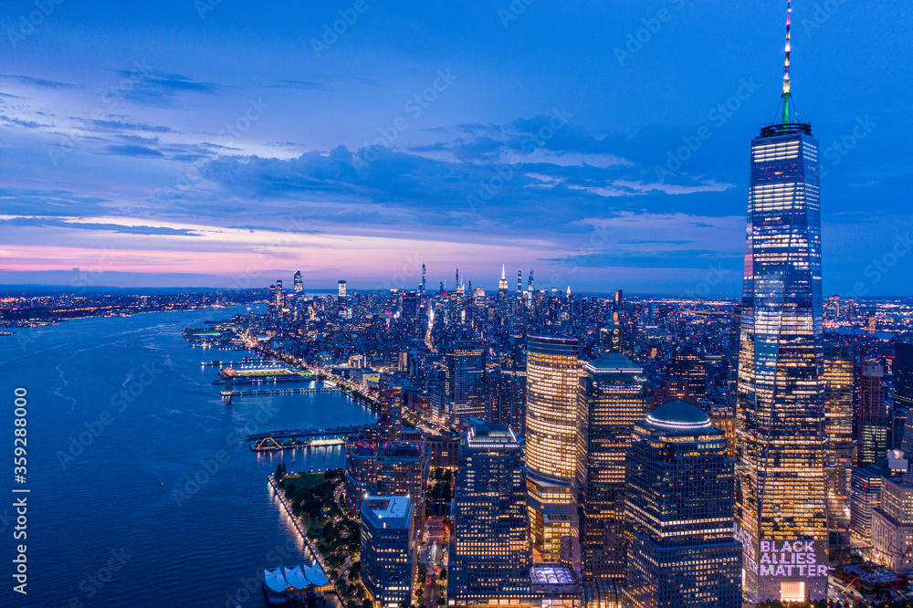 Aerial view of New York City skyline at sunset with both midtown, WTC ...