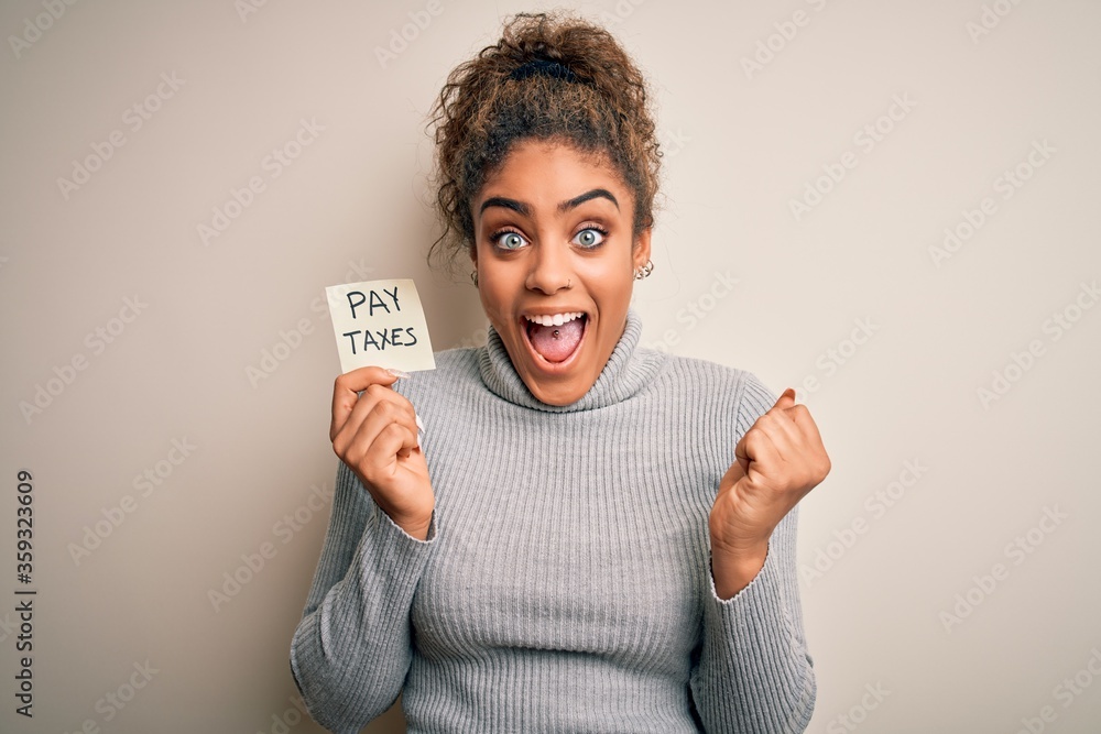 Stock-Foto „Young african american afro girl holding reminder paper ...