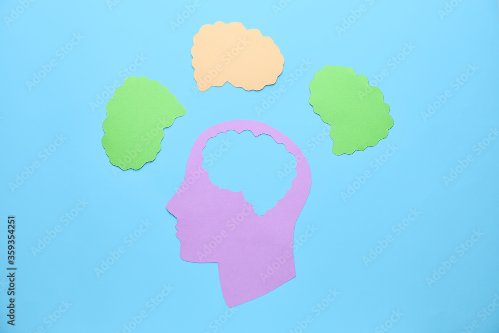 Paper human head and brains on color background Stock Photo | Adobe Stock