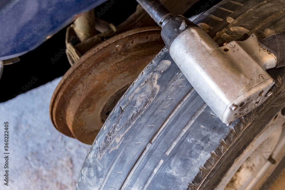 Workshop. Removed from a car wheel with a special tool. There is a lot ...