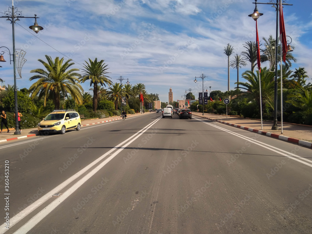 Avenue de Menara in Marrakech, Morocco. View of street with cars ...