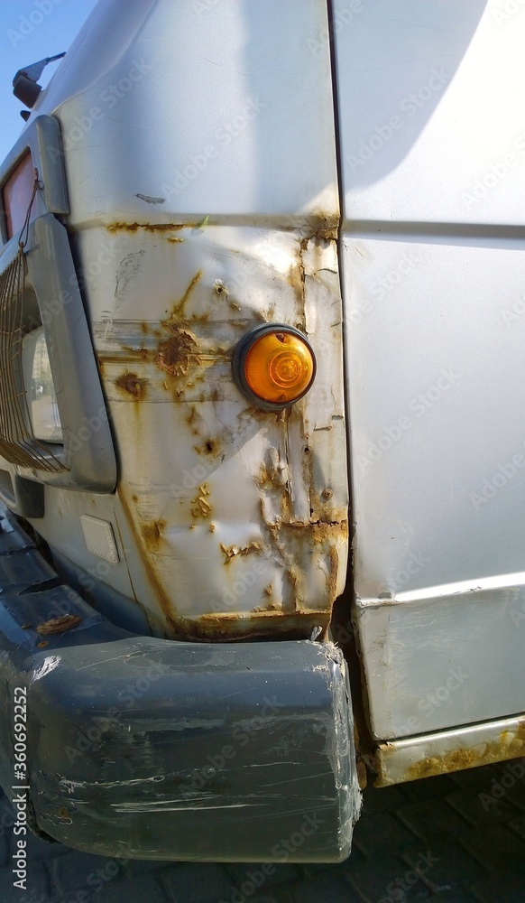 Truck with rust, corrosion, defects and scratches, close up. Car body ...
