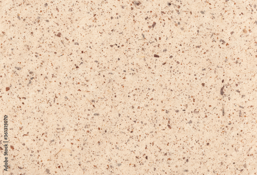 Sheet of hand crafted rough paper background with inclusions of natural ...