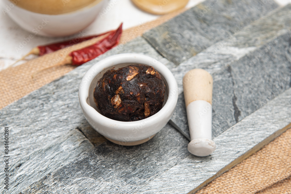 Tamarind paste or chutney, Imli or imalee crushed to paste served as a ...