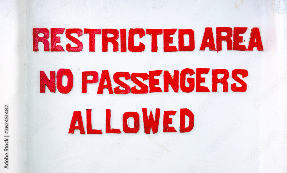 Red sign Restricted area No passenger allowed on white background ...