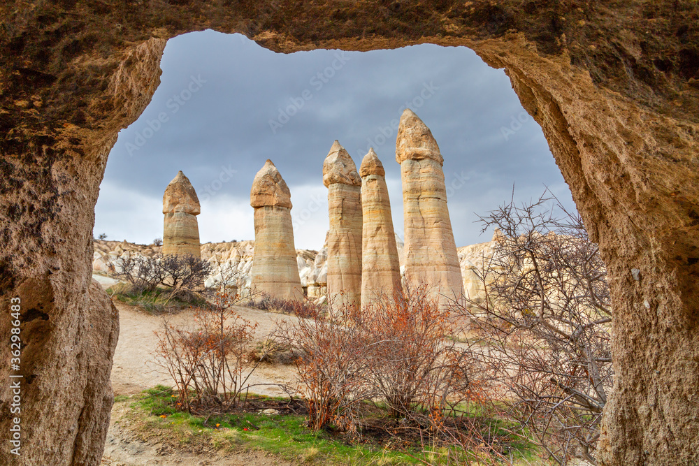 Cappadocia with volcanic rock formations, known as fairy chimneys ...