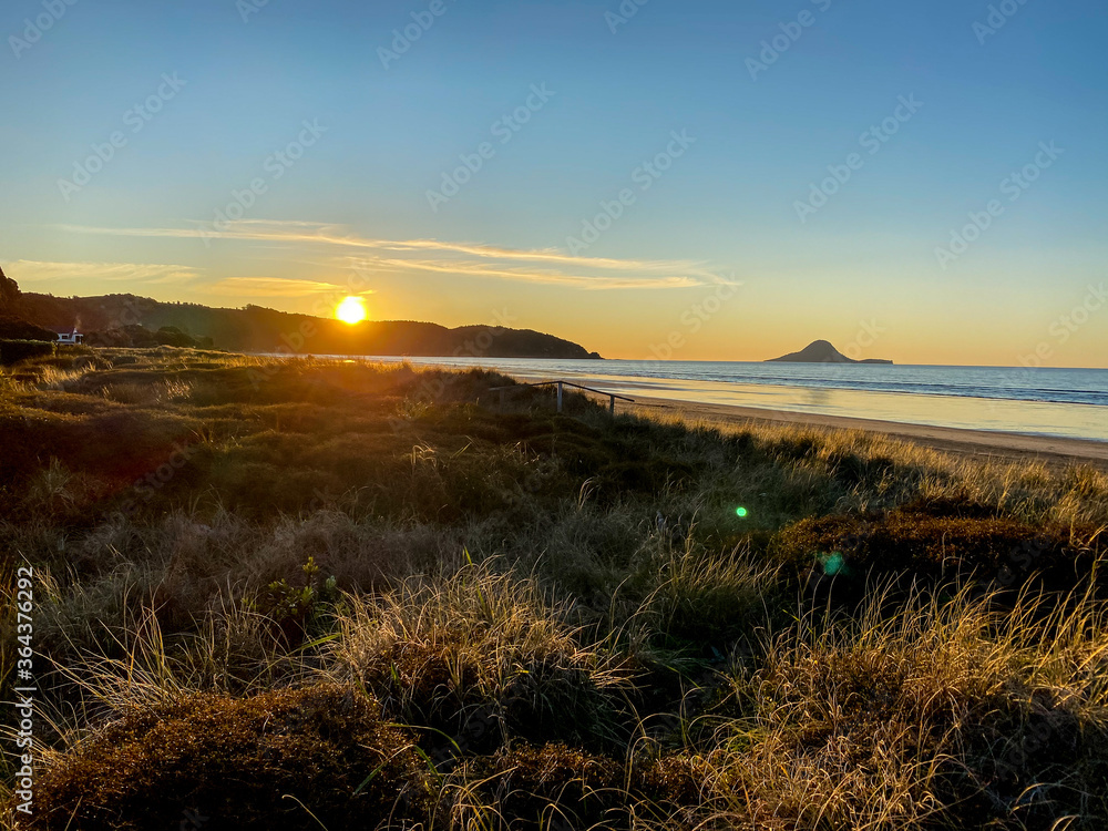 Stock-Foto „Ohope beach near Whakatane at sunset in New zealand ...