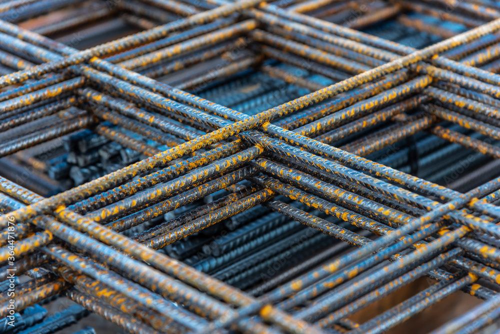 Iron reinforcing bar also known as rebar is stacked ready to be used in ...