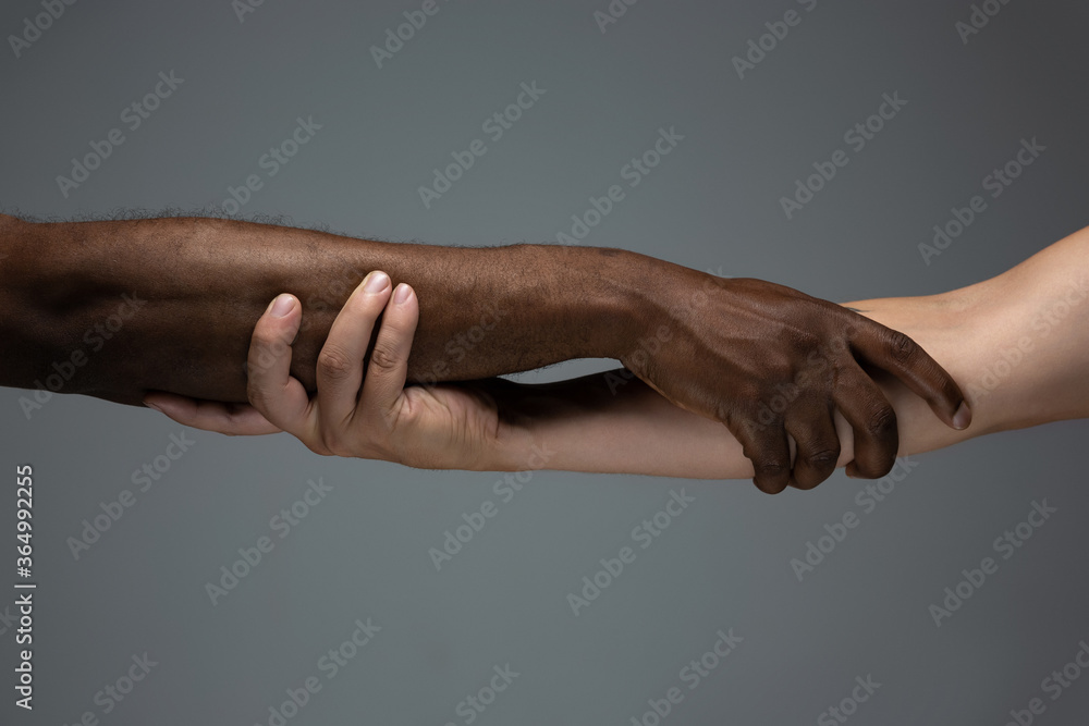 Helping hands. Racial tolerance. Respect social unity. African and ...