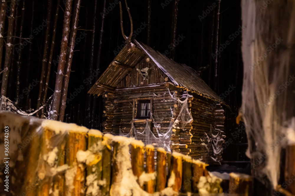 hut on chicken legs in the woods at night Stock Photo | Adobe Stock