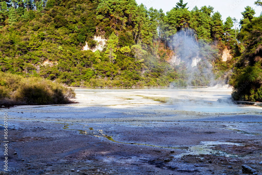 Muds, ponds with blue, turquoise hot water, pools, steams and caves in ...